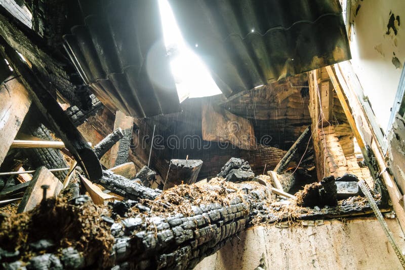 Burnt Wooden Attic Structures and Roof Sheets after a Fire Stock Photo ...