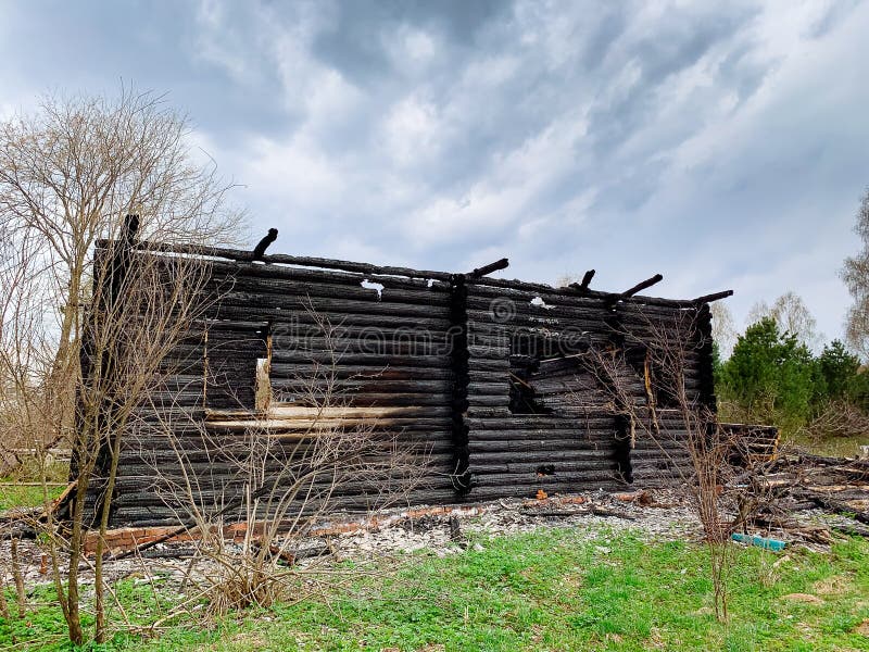 Burnt wooden house stock photo. Image of construction - 147497216