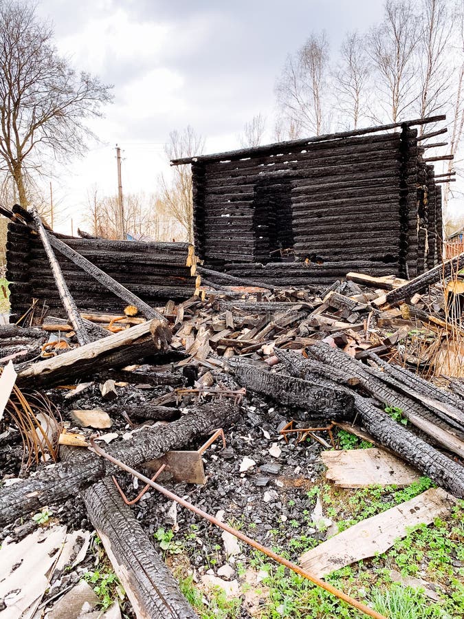 Burnt wooden house stock image. Image of destruction - 147497399