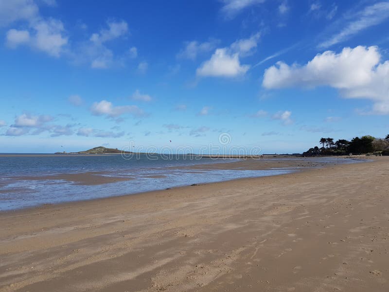 Burrow Beach in Sutton IRELAND Stock Image - Image of wave, sutton ...