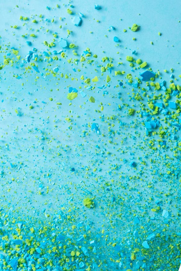 A Burst of Colorful Blue-green Particles. Abstract Splash Vertical ...