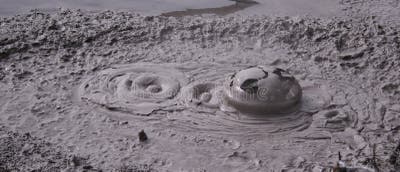 Bursting Mud Bubble in a Geothermal Pool in NZ Stock Photo - Image of ...