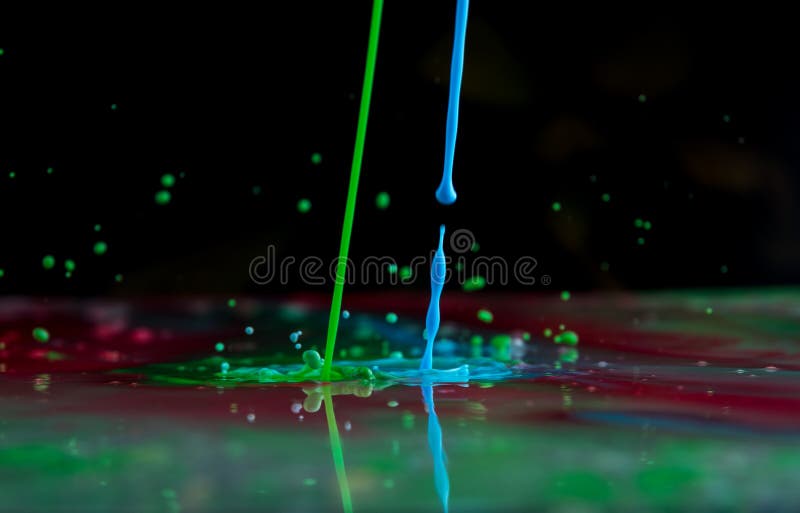 Bursts and Splashes from Falling Paints of Different Colors Stock Image ...
