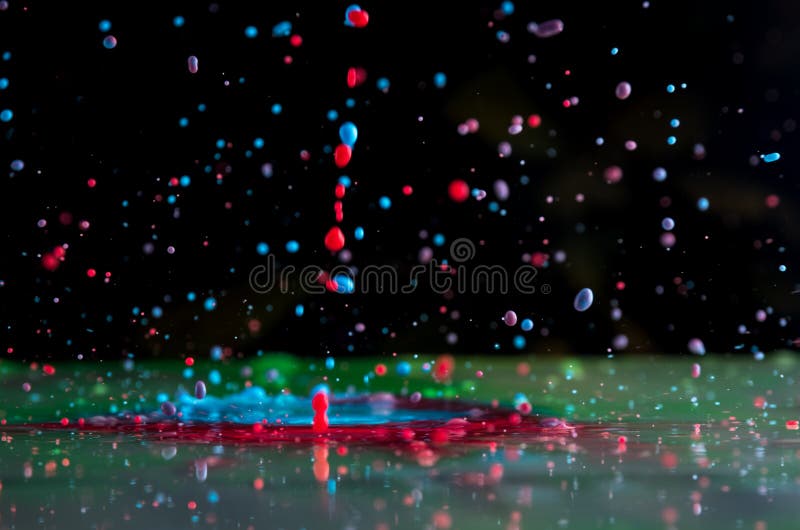 Bursts and Splashes from Falling Paints of Different Colors Stock Image ...