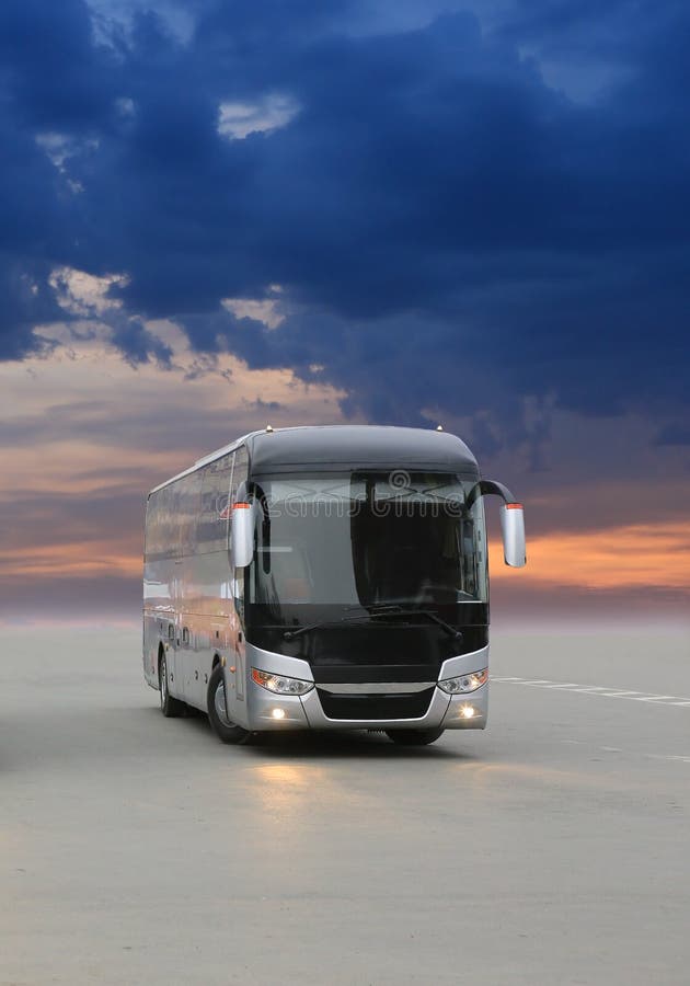 Bus on Asphalt in the Evening on Sunset Stock Photo - Image of ...