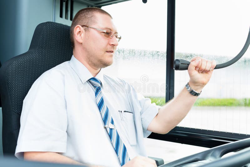 Bus Driver Making Announcement Using Microphone Stock Image - Image of ...