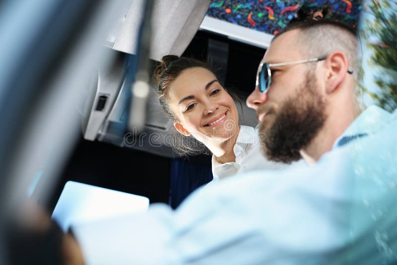 Bus driver and passenger stock image. Image of road, looks - 94377295