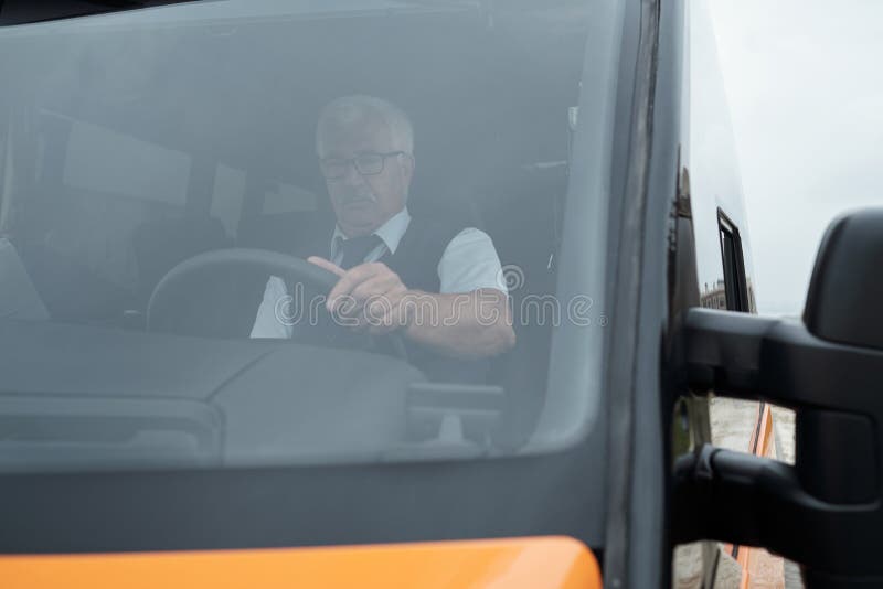 Bus Driver Looking Behind Stock Photos - Free & Royalty-Free Stock ...