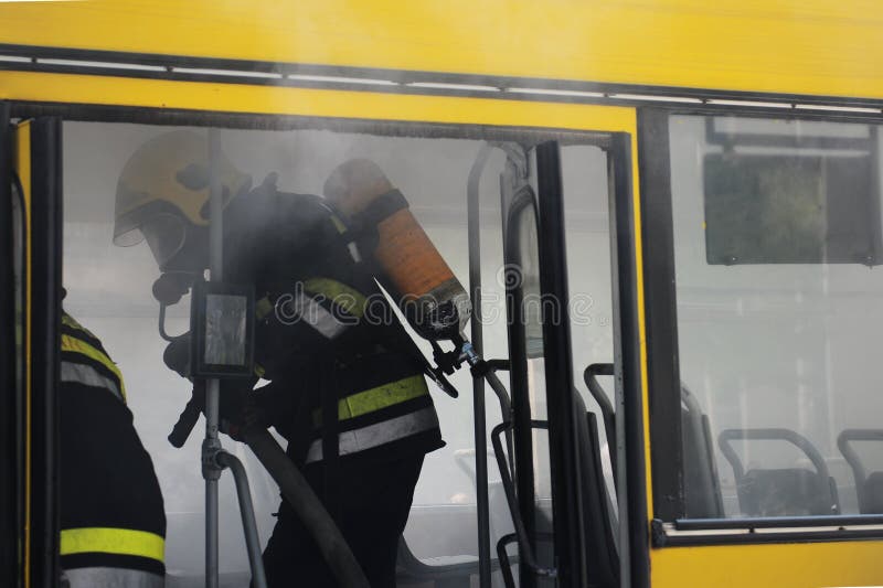 Bus on fire on the street editorial photography. Image of fireman ...