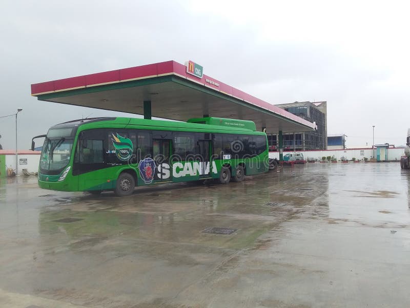 Bus in a Gas Station on a Rainy Day Editorial Stock Image - Image of ...