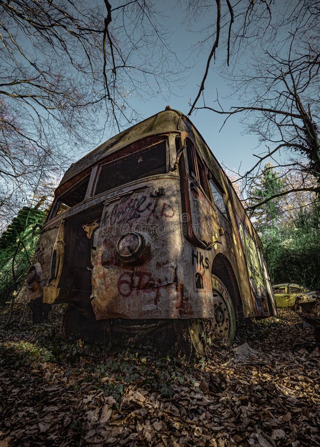 A Rusted Out Bus Sitting on the Side of the Road Stock Photo - Image of ...