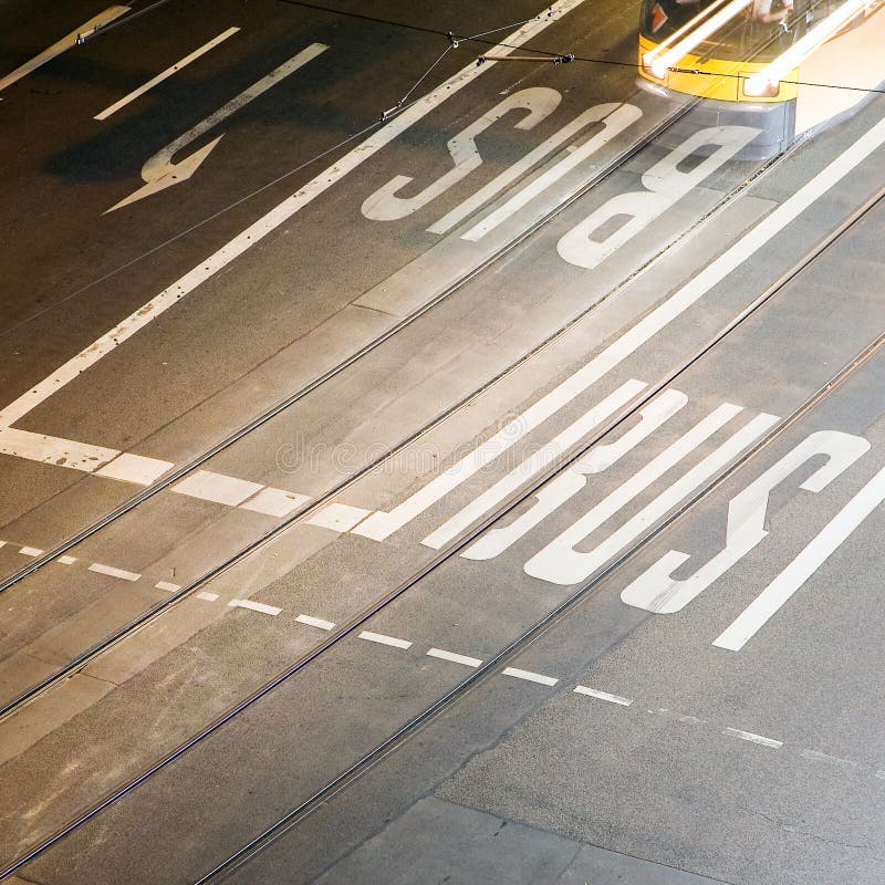 Bus lane and road markings stock image. Image of lines - 18360965