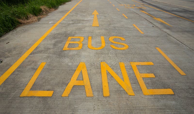 Bus lane sign on the road stock image. Image of transport - 55003021