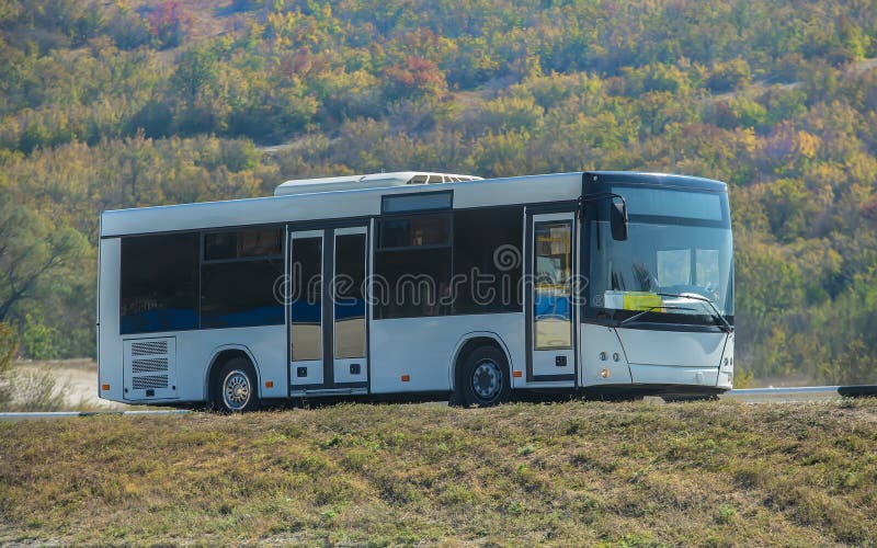 Bus moves along highway stock image. Image of coach - 235134473
