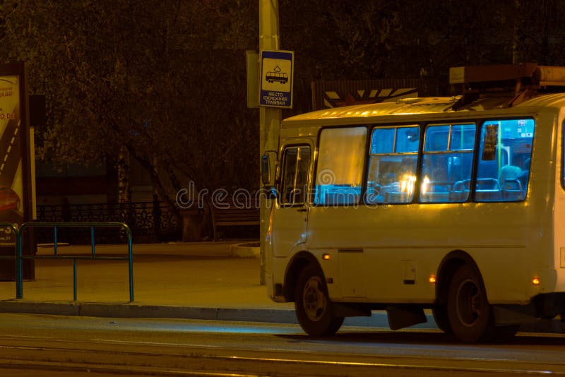 Bus Moves on City Street at Night Stock Photo - Image of transport ...