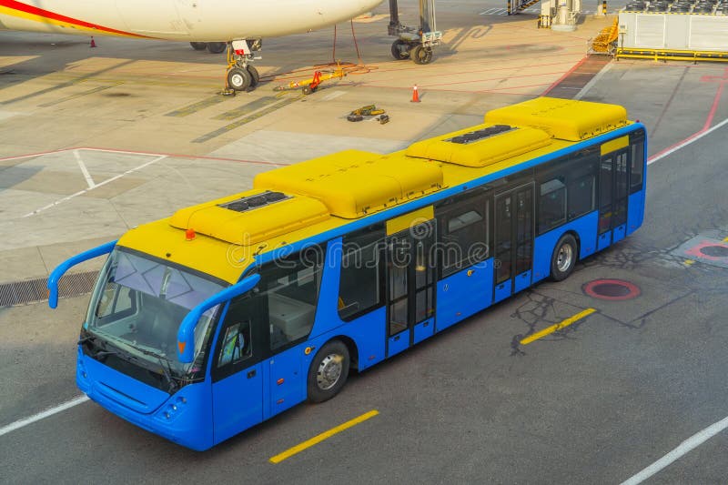 Bus with Passengers is Passing by To Board the Plane, Airport ...