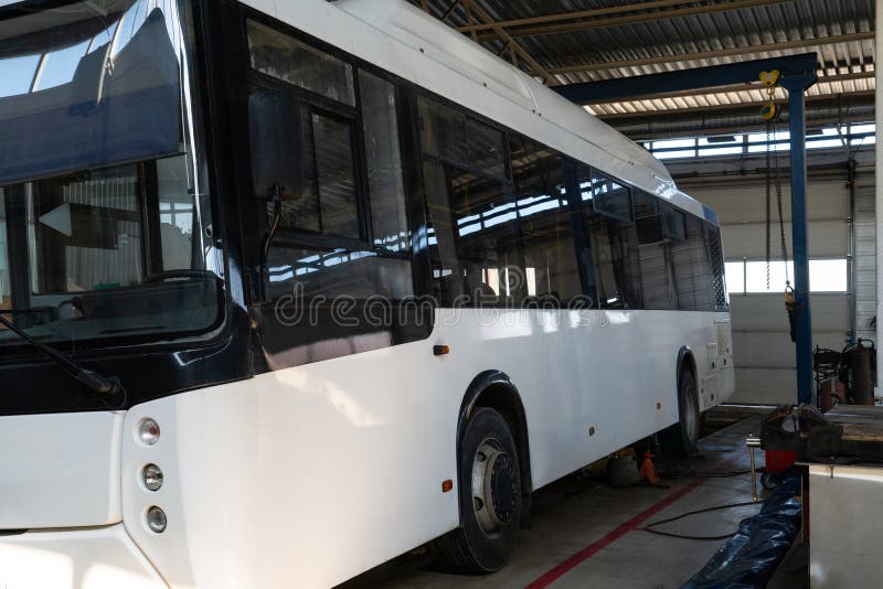 Bus repair in car service stock image. Image of test - 285610237