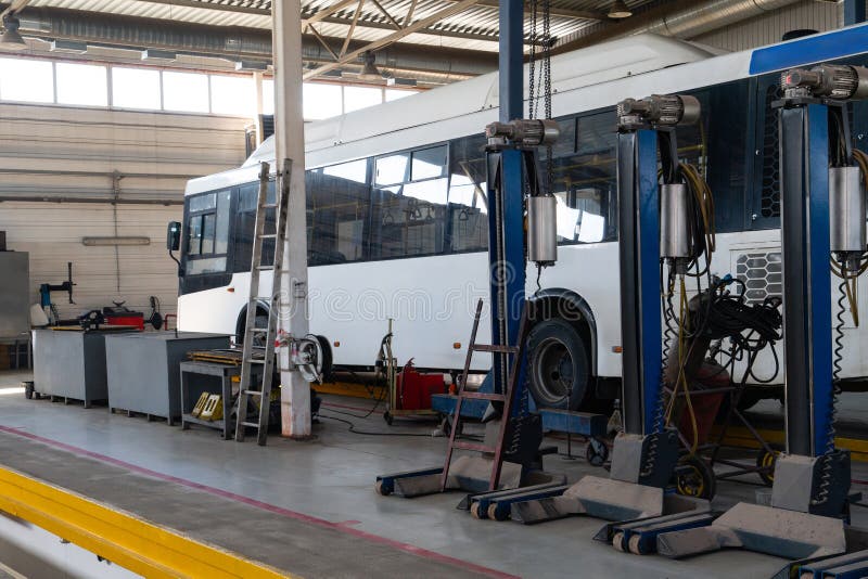 Bus repair in car service stock image. Image of engine - 289369129