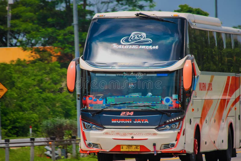 Bus in Road Speed Run Murni Jaya Editorial Photography - Image of murni ...