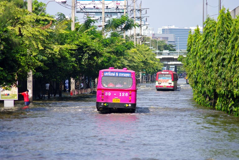 Bus on the Road with Water Flood Editorial Photography - Image of rainy ...