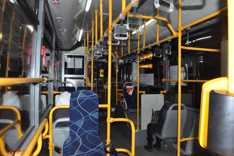 Empty bus cabin at night stock image. Image of coach - 211233729
