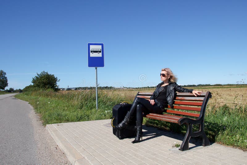 Bus Stop in the Countryside Stock Photo - Image of alone, female: 26433502