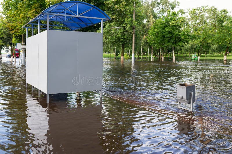 The Bus-stop is Flooded after Heavy Rain Stock Photo - Image of sitting ...