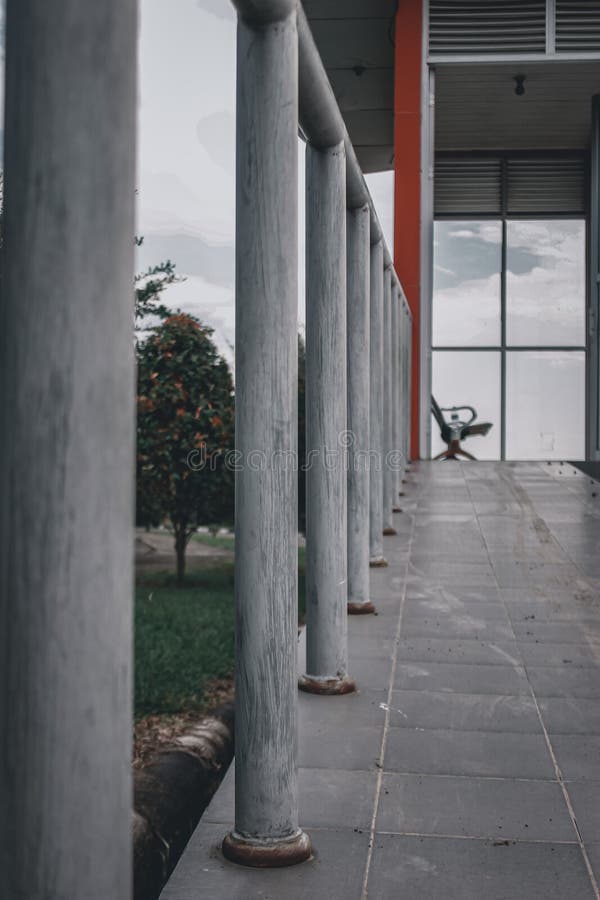 The Bus Stop in Front of the Campus Area Stock Photo - Image of column ...
