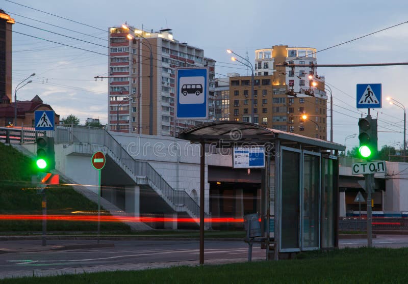 Bus Stop and a Green Traffic Light Stock Photo - Image of auto, marking ...