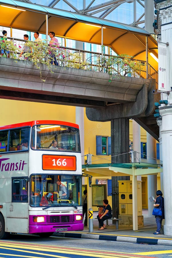 Bus Stop with Passengers and Tourists in Singapore Editorial Image ...