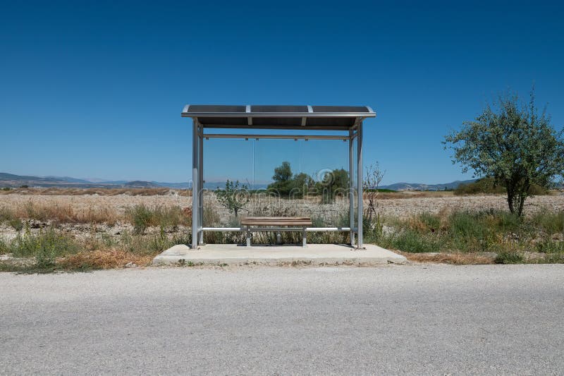 Bus stop by the roadside stock image. Image of background - 352523205