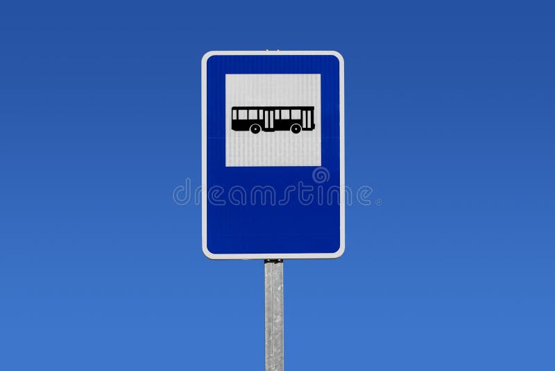 Bus stop sign on pole stock photo. Image of blue, daytime - 169465524