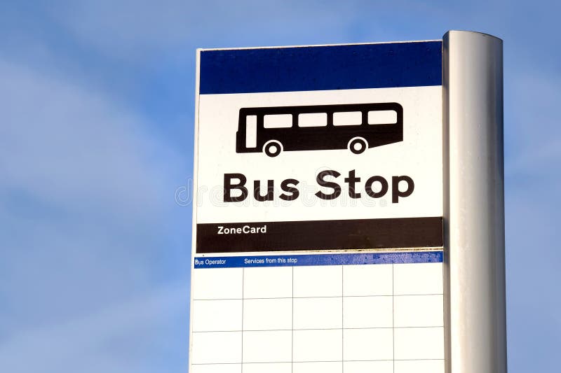 Bus Stop Sign on Post Against Blue Sky Stock Photo - Image of public ...