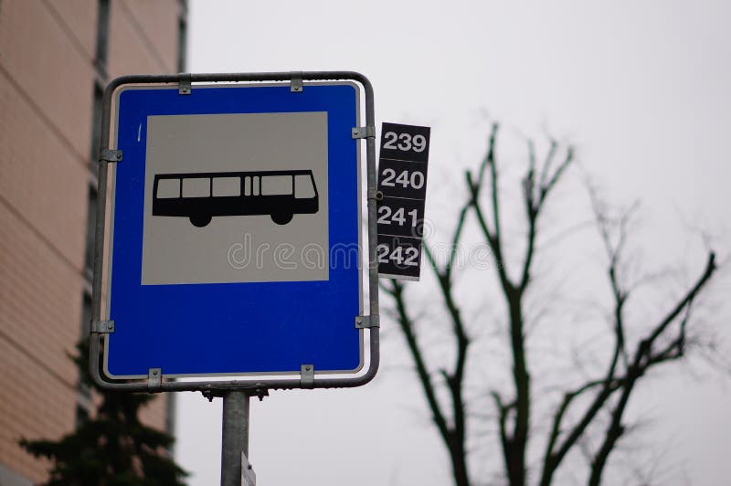 Bus Stop Sign on a Post in the City. Stock Image - Image of stop, post ...