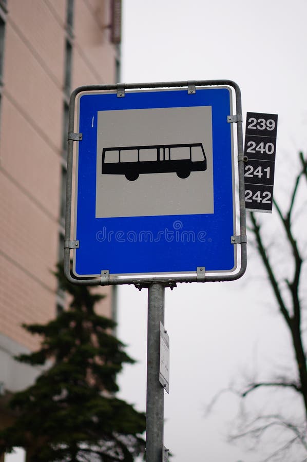 Bus Stop Sign on a Post in the City. Stock Photo - Image of post, sign ...