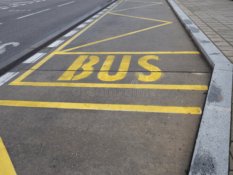 Bus stop sign stock image. Image of yellow, mass, road - 256172729