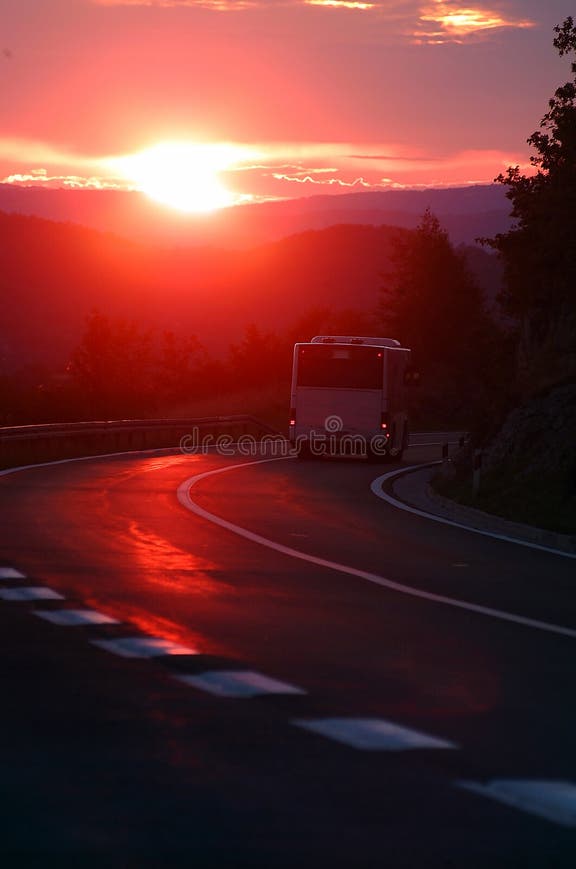 Bus in sunset stock photo. Image of roadway, tapes, route - 1202128