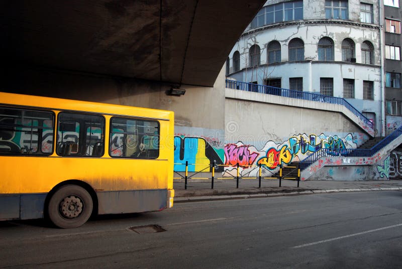 Bus under the bridge stock photo. Image of stops, tunnel - 67558800
