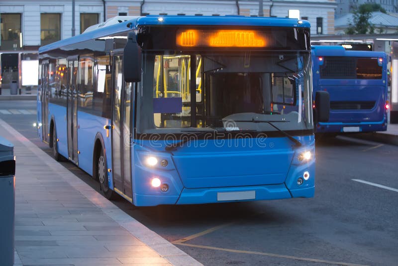 Buses on the city street stock photo. Image of landmark - 138146896
