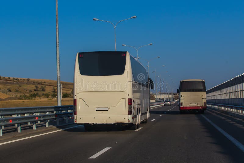 Buses Move Along the Highway Stock Photo - Image of ride, highway ...
