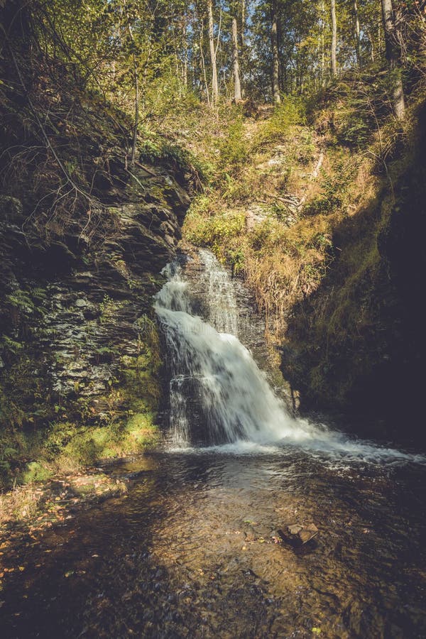 Bushkill Falls in Poconos, PA, Surrounded by Lush Fall Foliage Stock ...