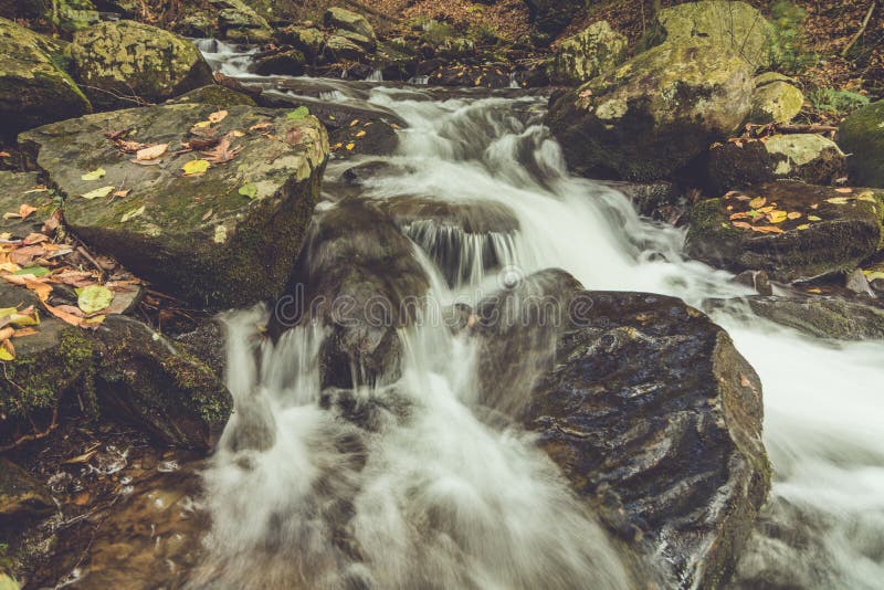 Bushkill Falls in Poconos, PA, Surrounded by Lush Fall Foliage Stock ...