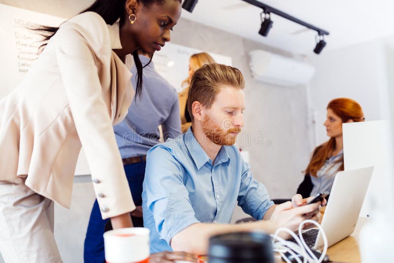 Busiensswoman Advising Colleague Stock Image - Image of professional ...