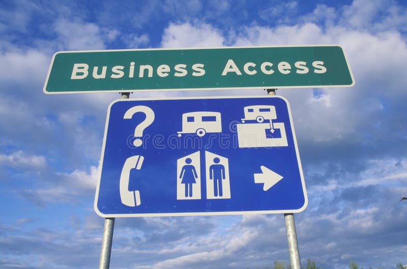 Business Access Road Directional Sign Stock Photo - Image of alert ...