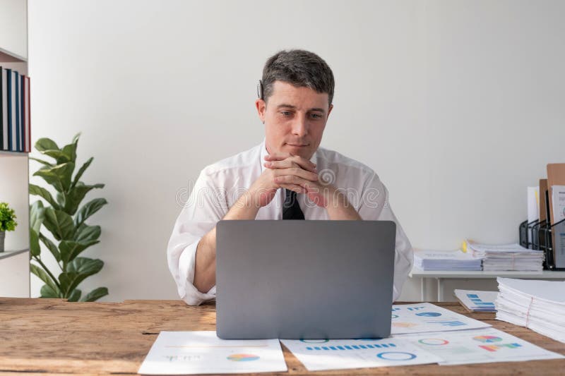 Business Accountant Bookkeeper in Office Looking at Documents and ...