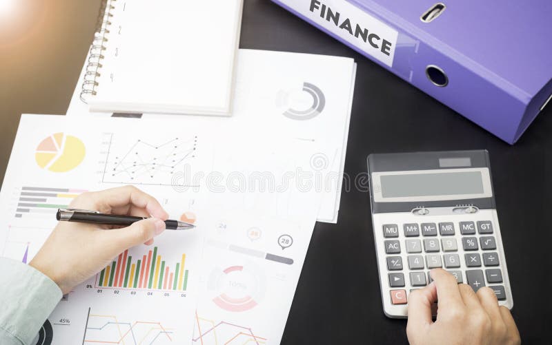 Business Accountants with Documents Graph Financial on Office Stock ...