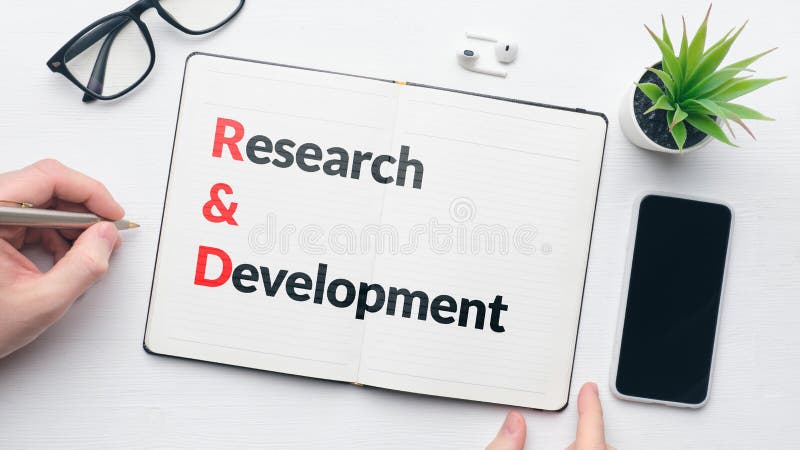 Business Acronym RD or Research and Development. Person Makes Notes in ...