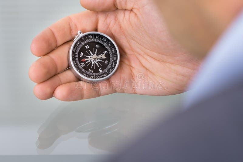 Business Advisor Holding Compass Stock Image - Image of public ...