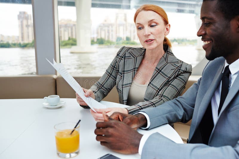 Explaining contract terms stock photo. Image of conversation - 99263898