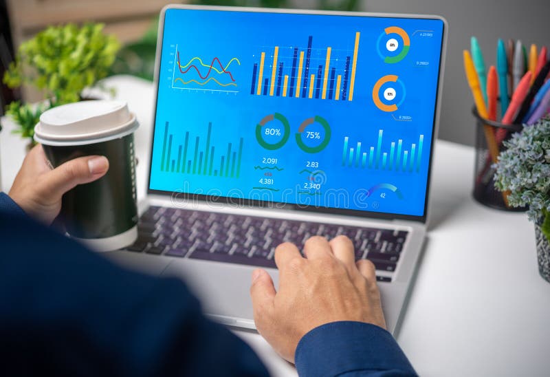 Software Analyst and Data Management System Working on a Report with ...